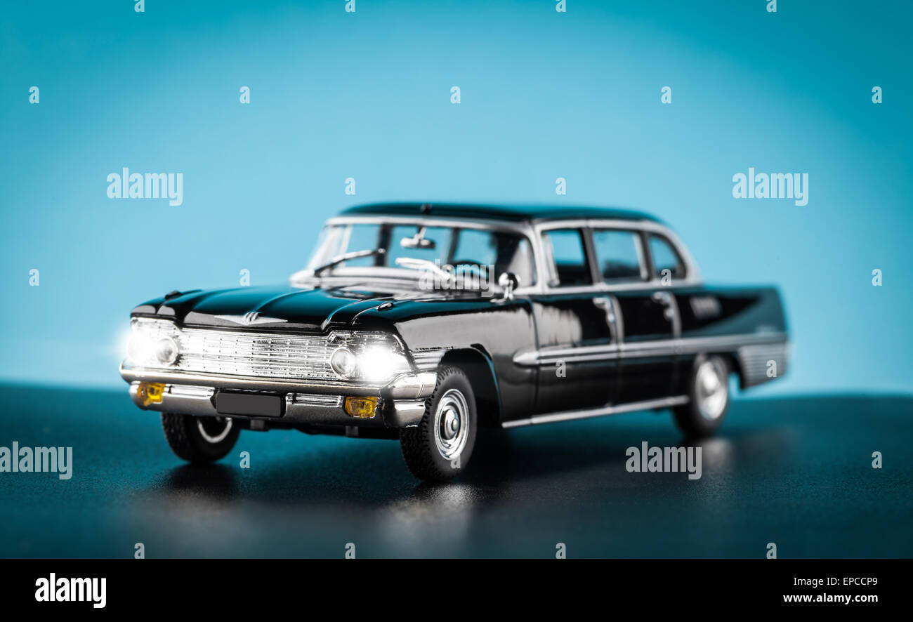 Vintage retro toy machine on a blue background Stock Photo - Alamy