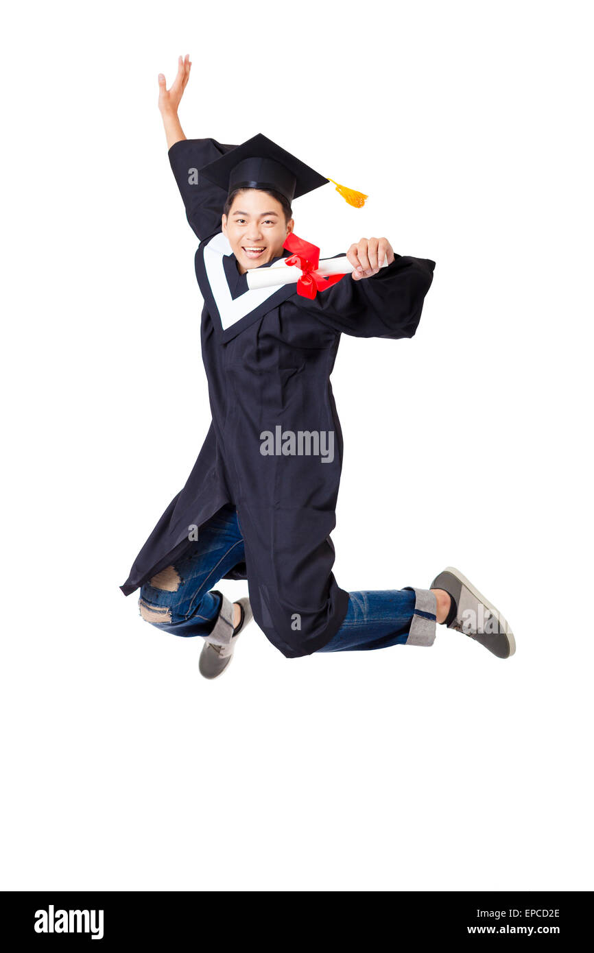Happy student in graduate robe jumping against white background Stock ...