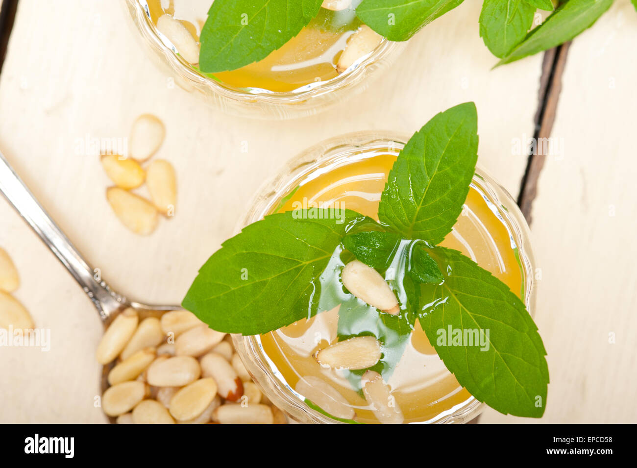Arab traditional style mint and pine nuts tea called at tay Stock Photo ...