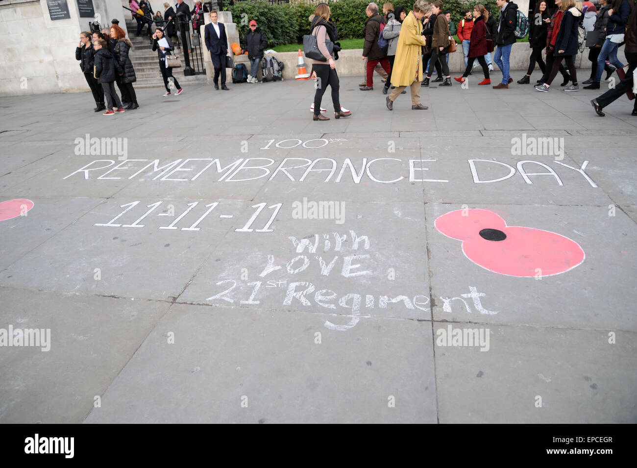 A crowd observe a two minute silence for Armistice Day in Trafalgar ...