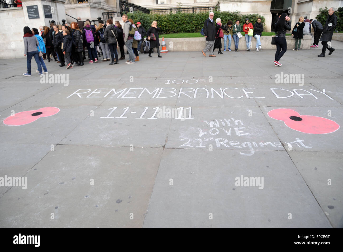A crowd observe a two minute silence for Armistice Day in Trafalgar ...