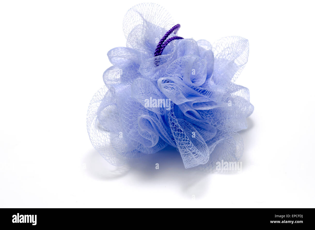 purple bath puff isolated on a white background Stock Photo - Alamy