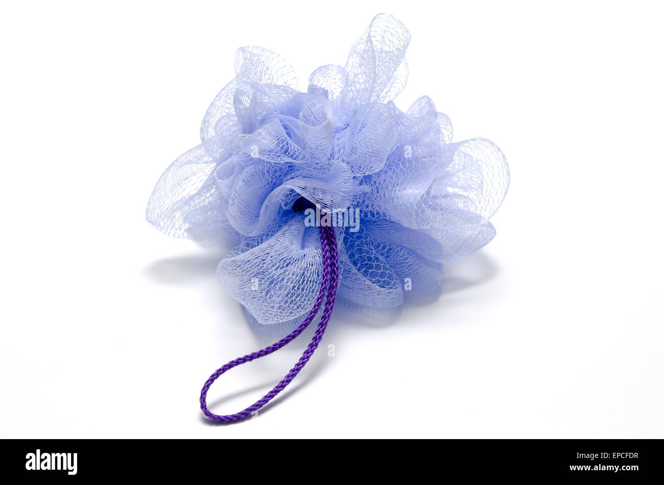 purple bath puff isolated on a white background Stock Photo - Alamy