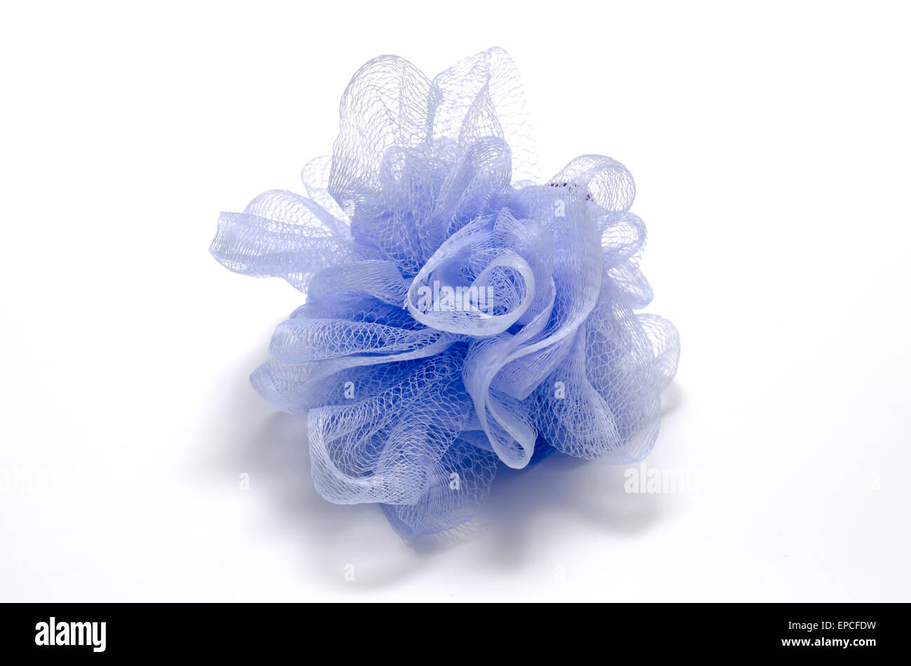 purple bath puff isolated on a white background Stock Photo - Alamy
