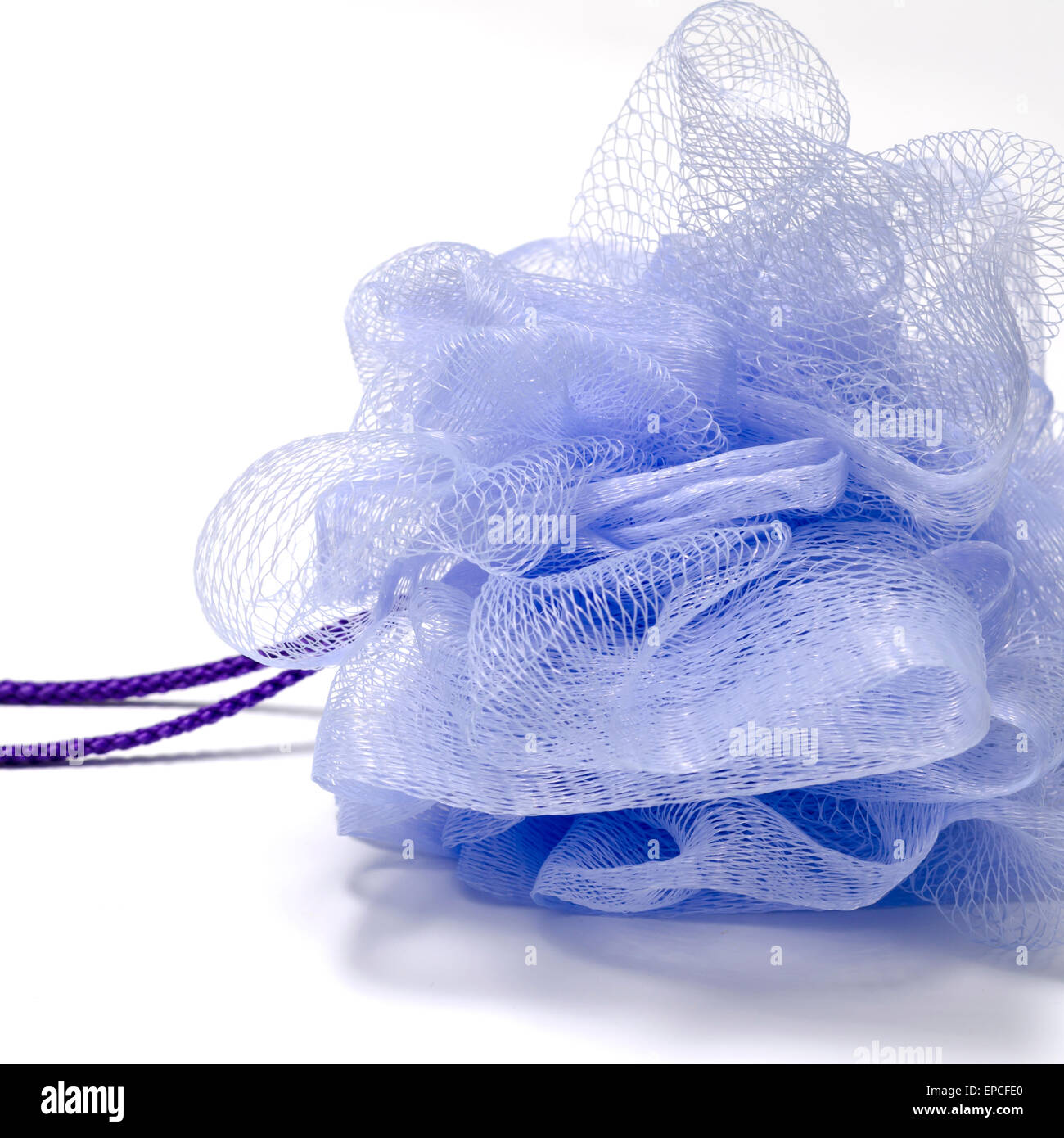 purple bath puff isolated on a white background Stock Photo - Alamy