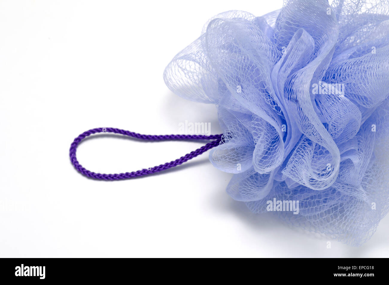 purple bath puff isolated on a white background Stock Photo - Alamy