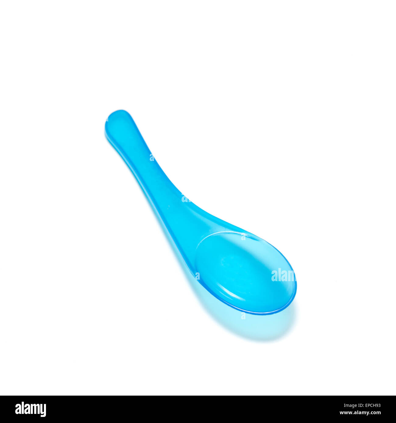 blue plastic spoon on a white background Stock Photo - Alamy