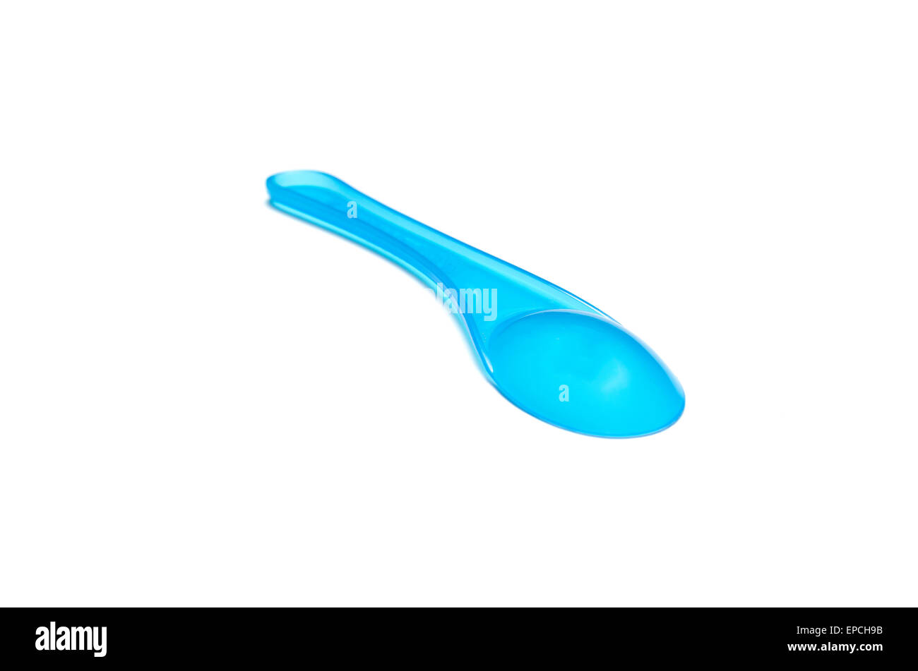 blue plastic spoon on a white background Stock Photo - Alamy