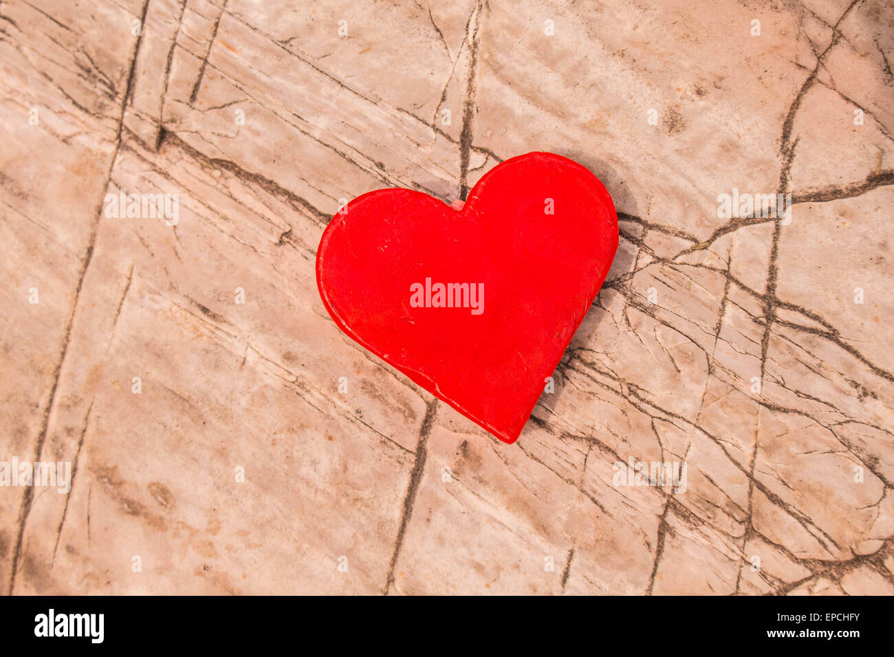 Shape of a red heart on a rock Stock Photo - Alamy
