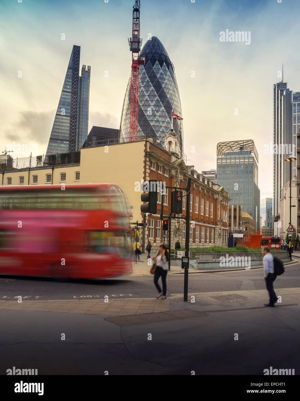 Modern day London street scene, red double decker bus in Central City ...