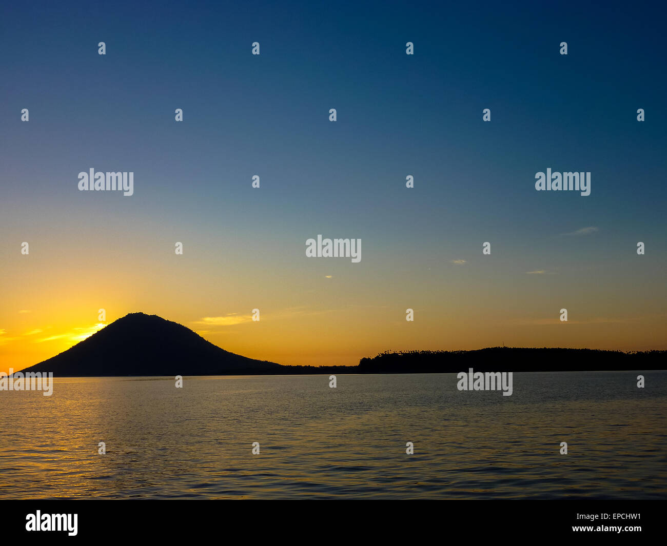 sunset and silhouette of volcano manado tua at sulawesi indonesia Stock ...