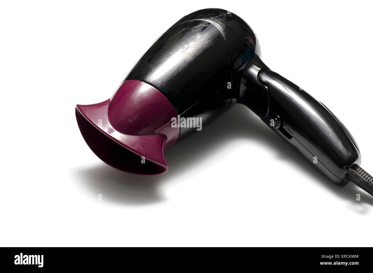 old used electric hair dryer on a white background Stock Photo - Alamy
