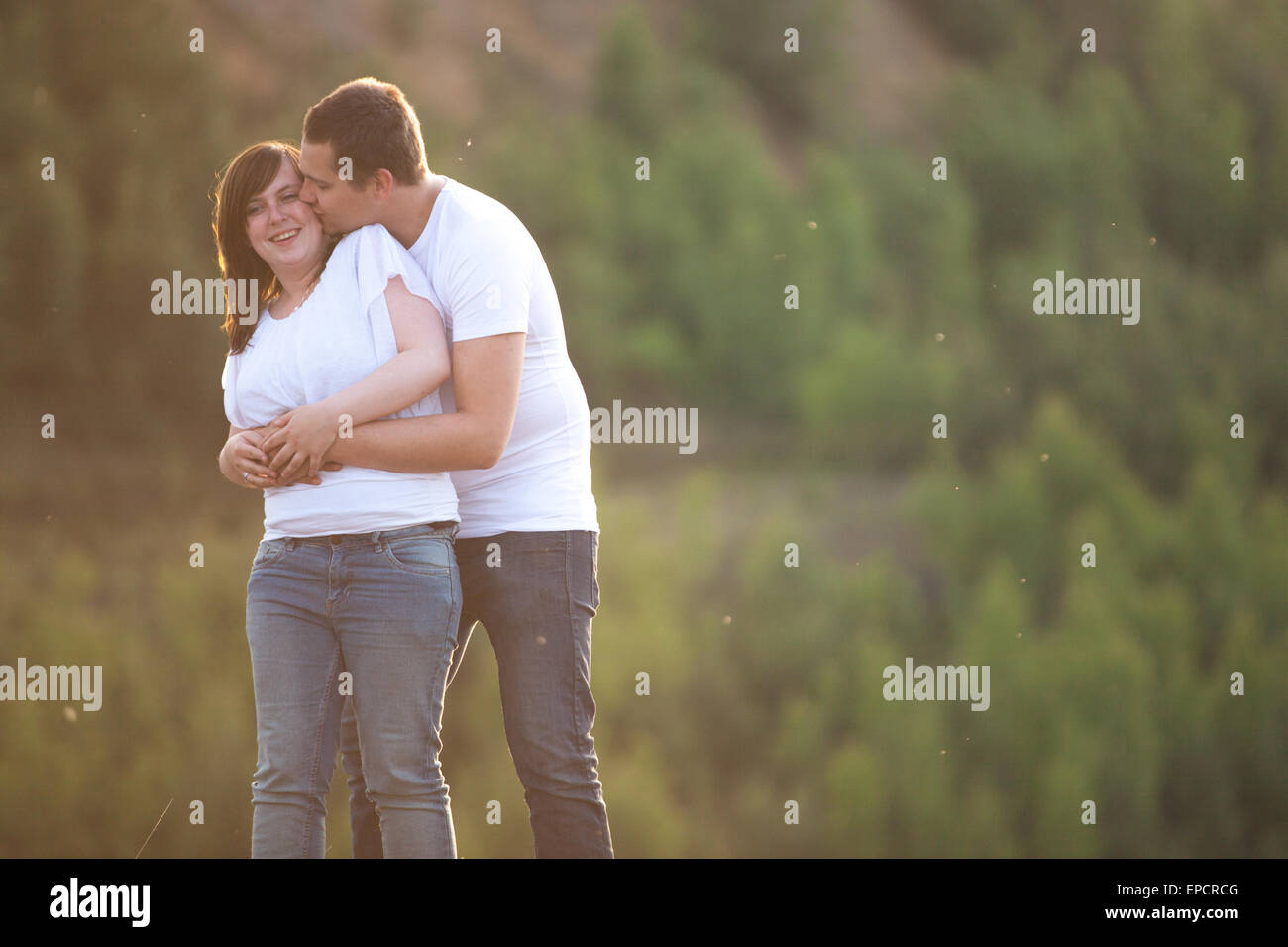 Young couple is having a romantic time in nature Stock Photo - Alamy