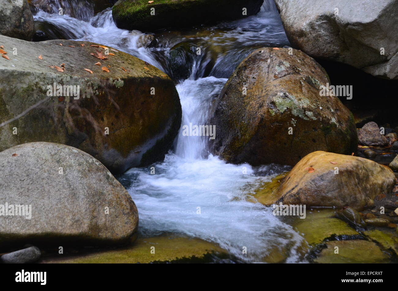Water cascading through rocks hi-res stock photography and images - Alamy