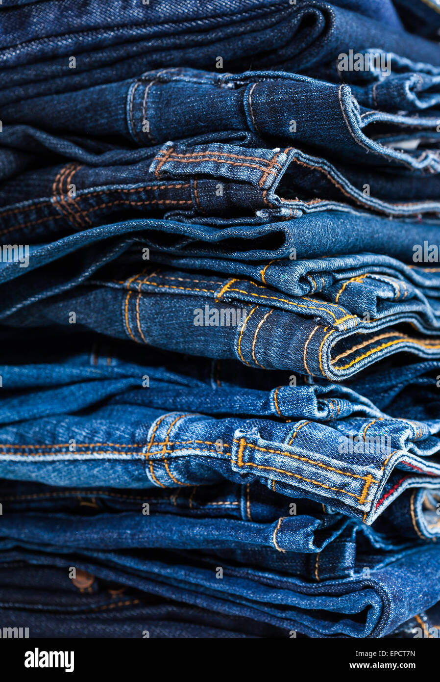 Stack of blue jeans - detail Stock Photo - Alamy