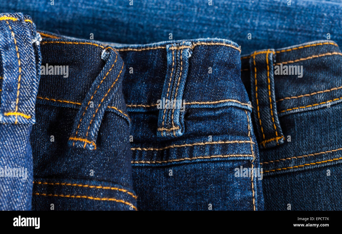 Stack of blue jeans - detail Stock Photo - Alamy