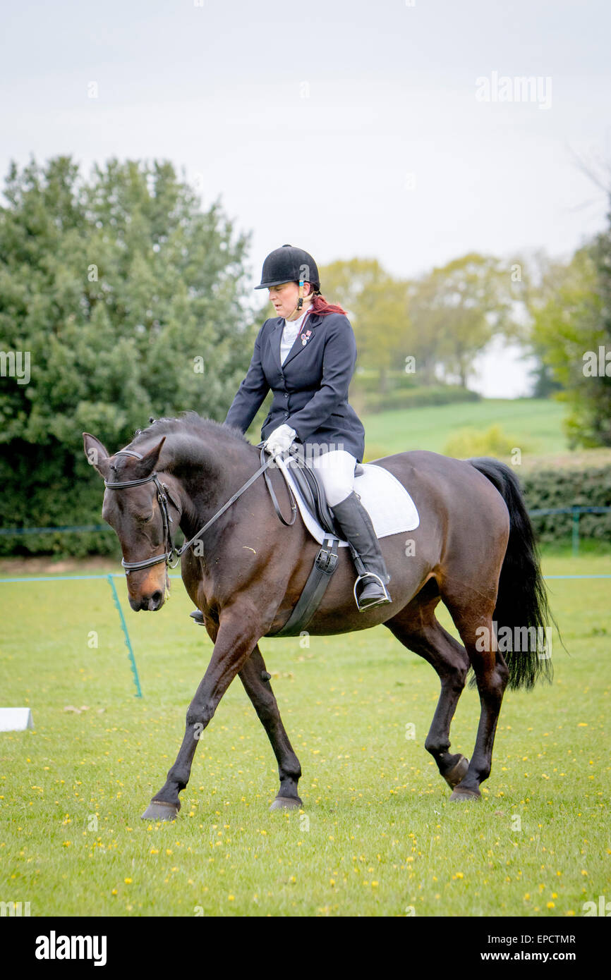 Riders and their horses take part in a local Riding Club Dressage Event ...