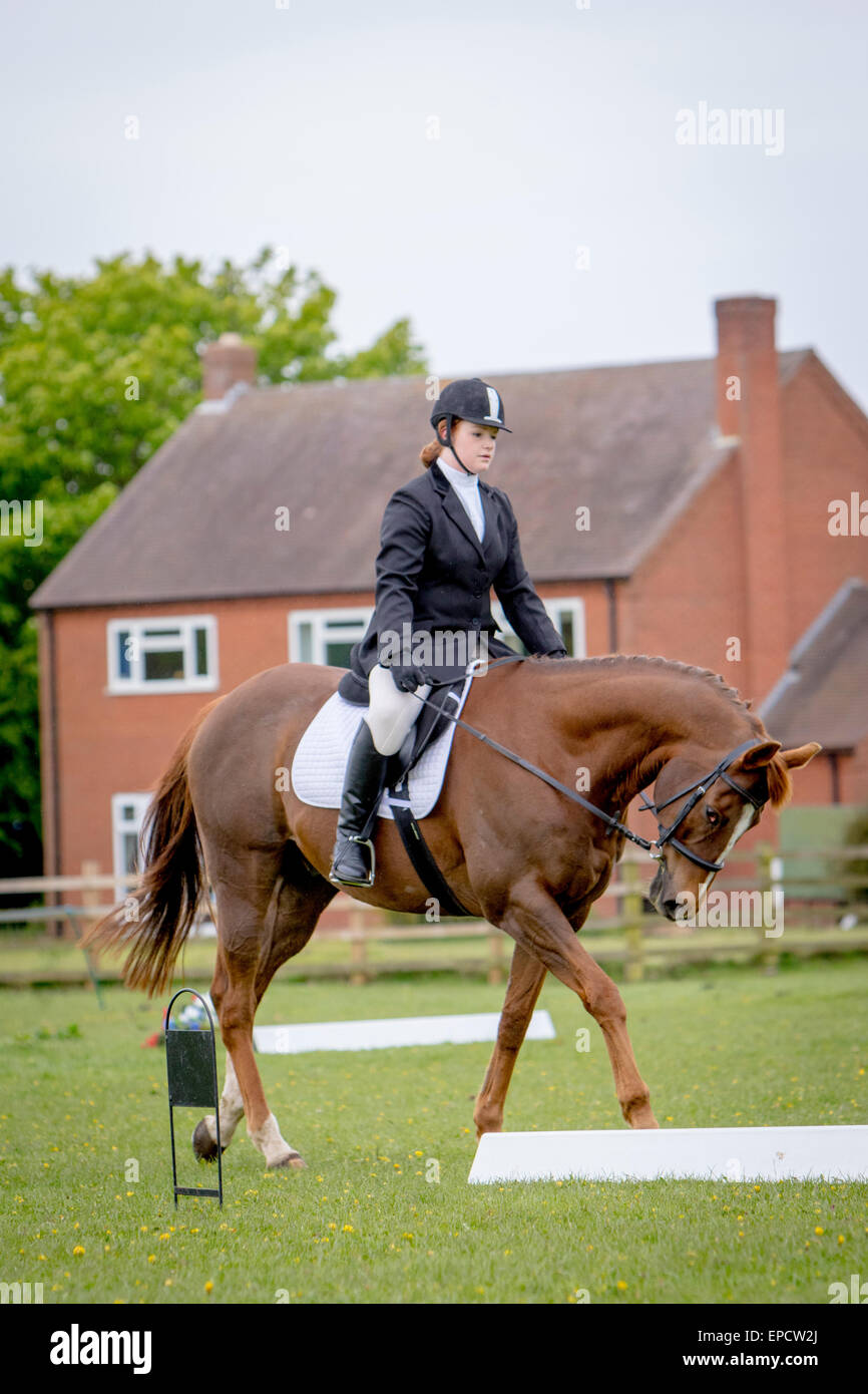 Riders and their horses take part in a local Riding Club Dressage Event ...