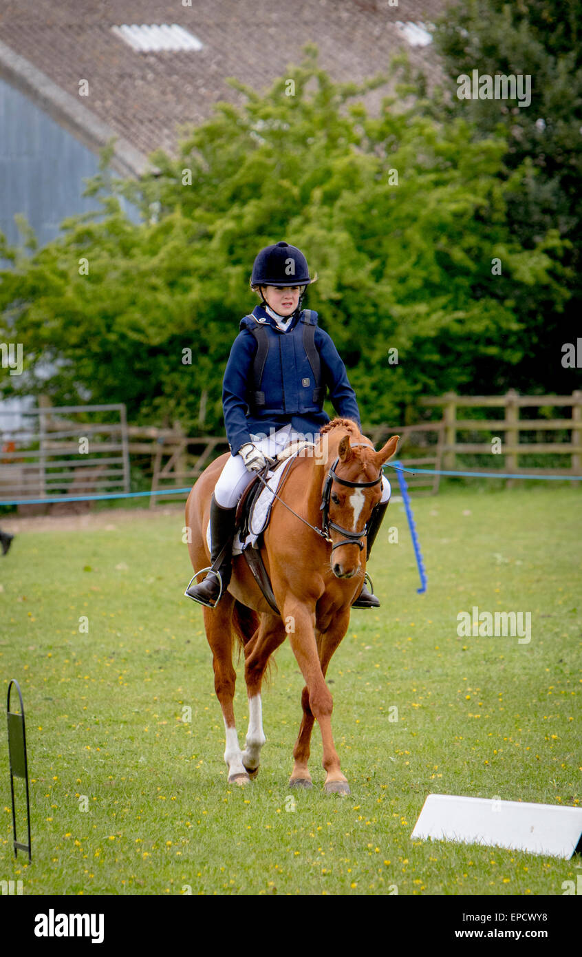 Riders and their horses take part in a local Riding Club Dressage Event ...