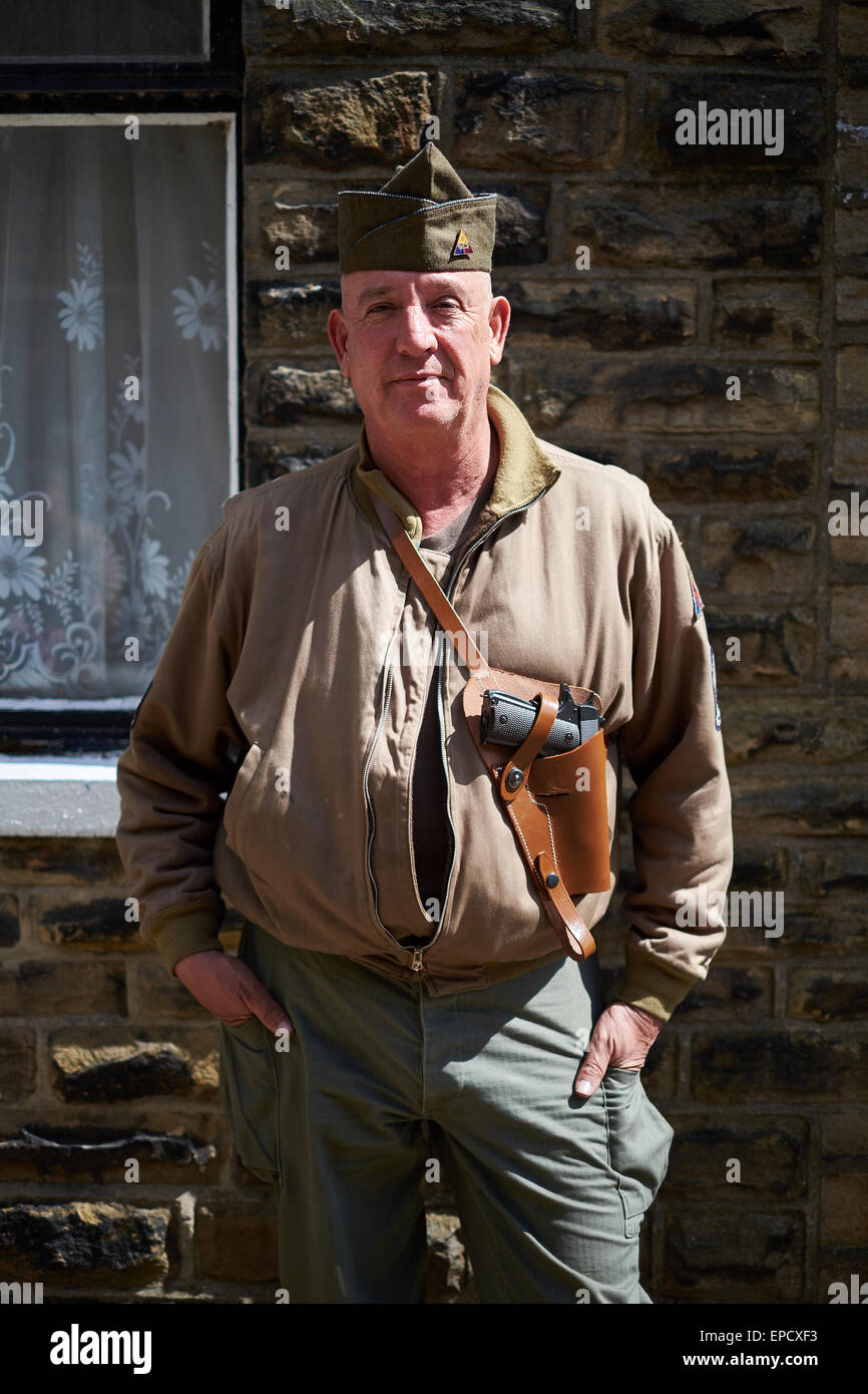 Man dressed in American GI soldier uniform with gun in holster Stock ...