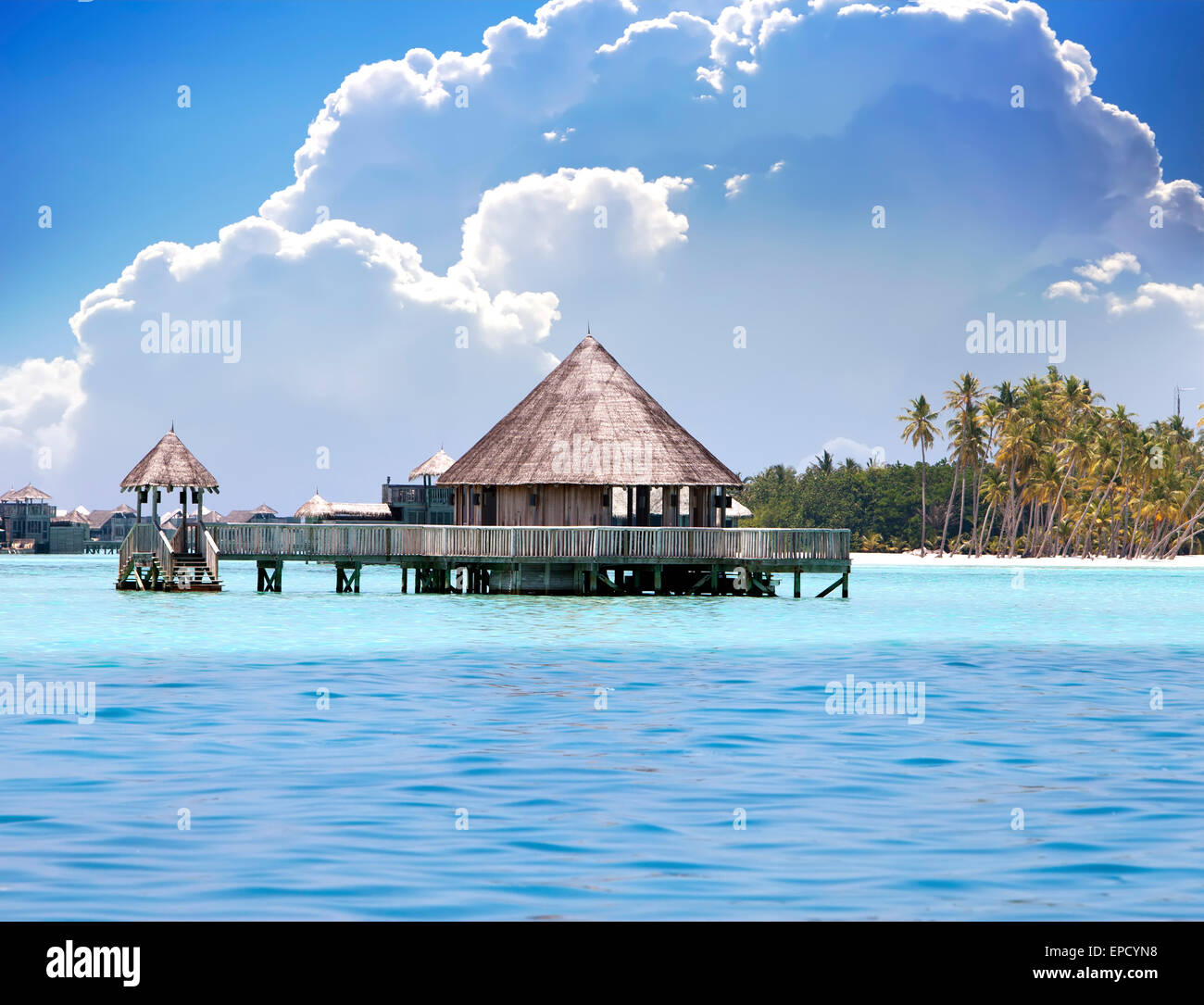 houses on piles on sea. Maldives Stock Photo - Alamy