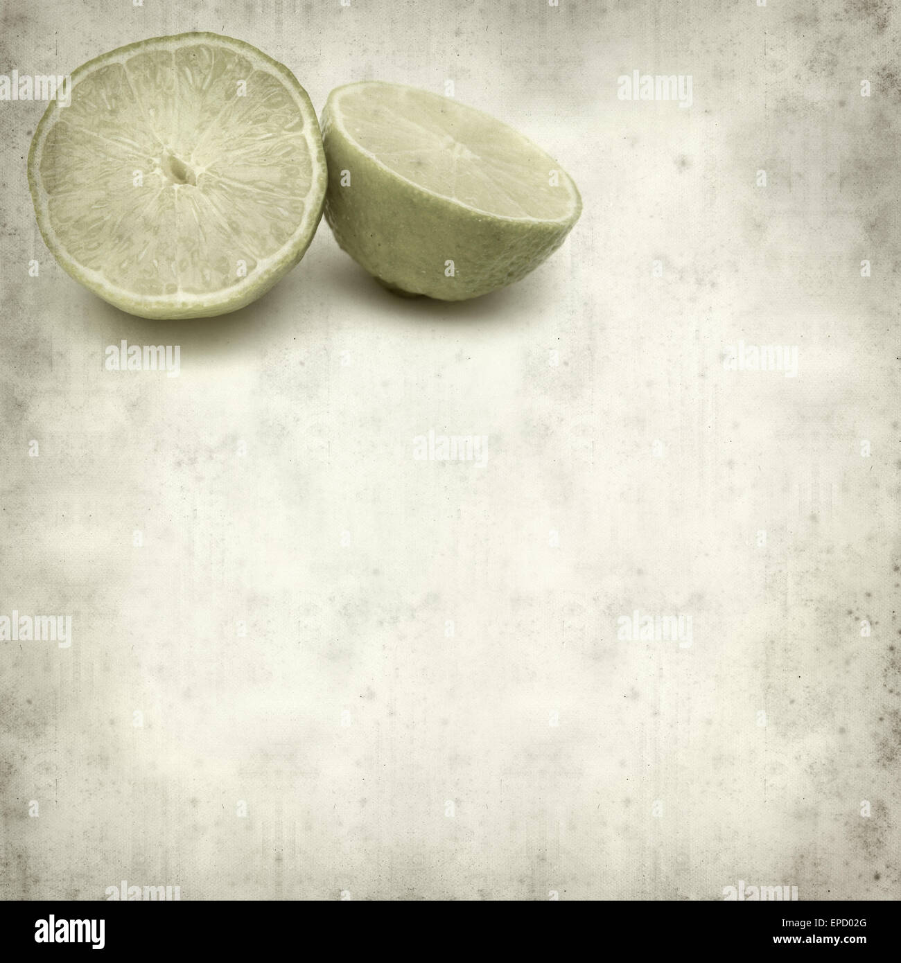 textured old paper background with cut lime fruit Stock Photo - Alamy