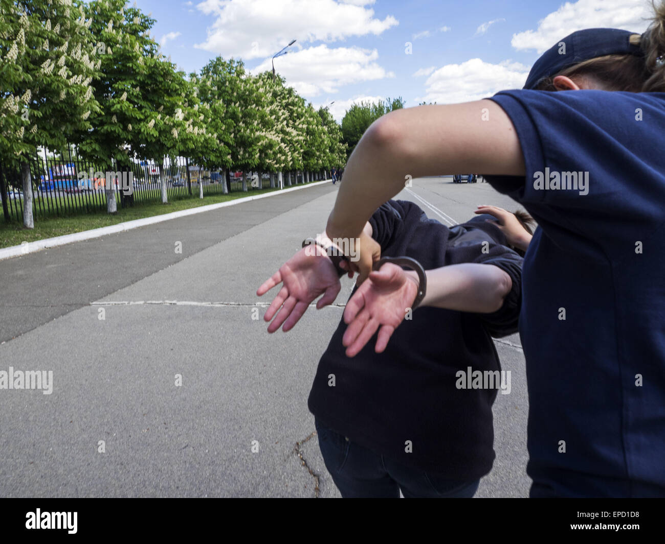 May 16, 2015 - female police officer is handcuffed to a criminal Credit ...