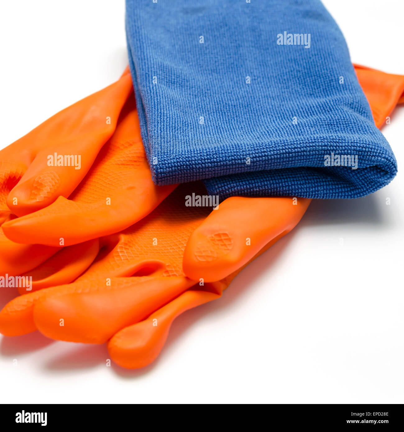 blue rag with orange cleaning glove on a white background Stock Photo ...