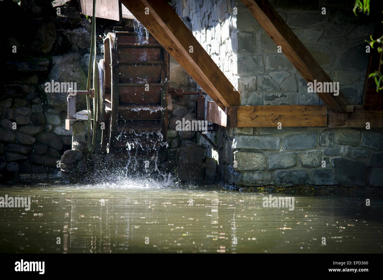 Decorative watermill wheel Stock Photo - Alamy