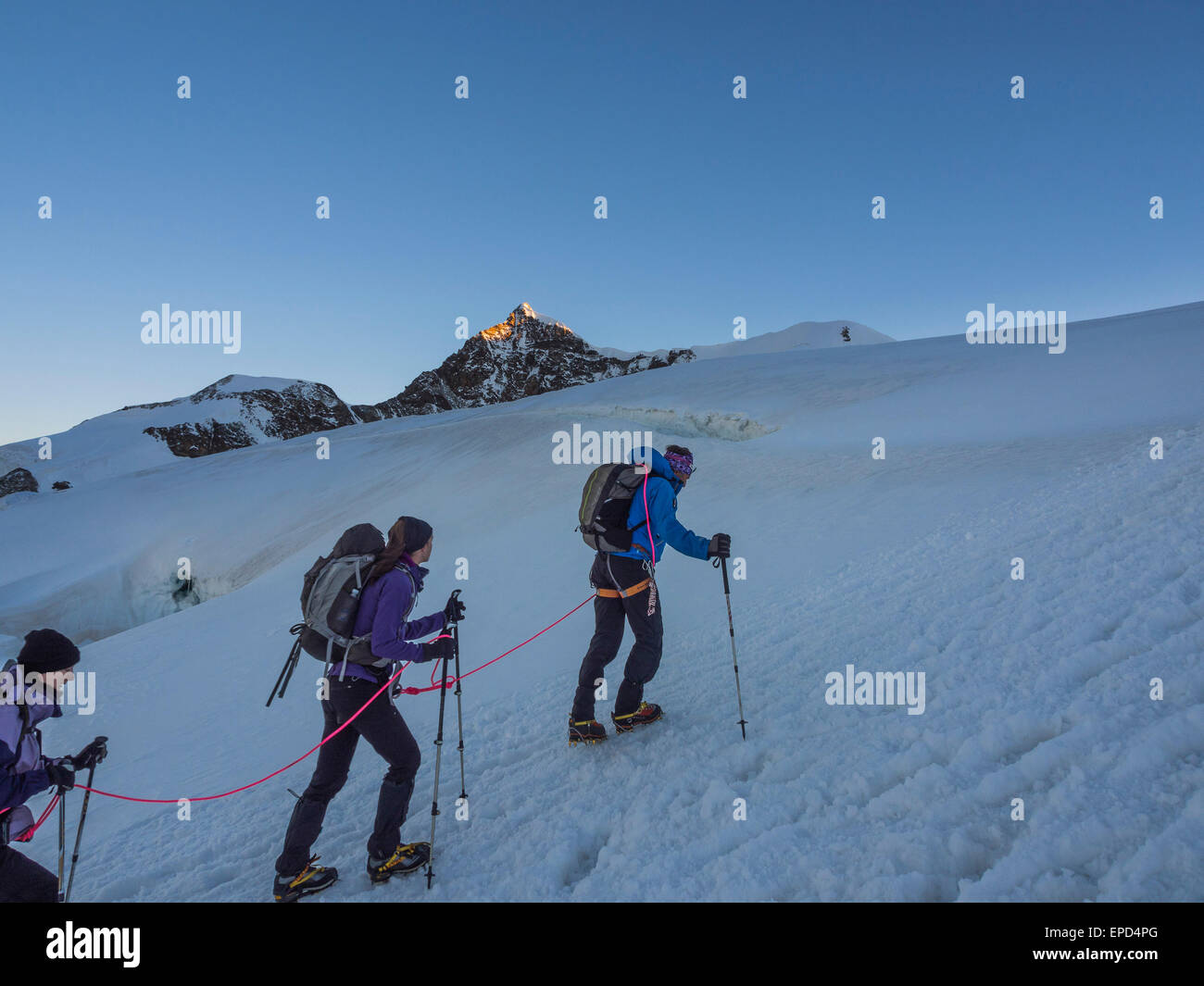 Climbers on Monte Rosa behind Lyskamm peak, Monte Rosa, Alps, Italy ...