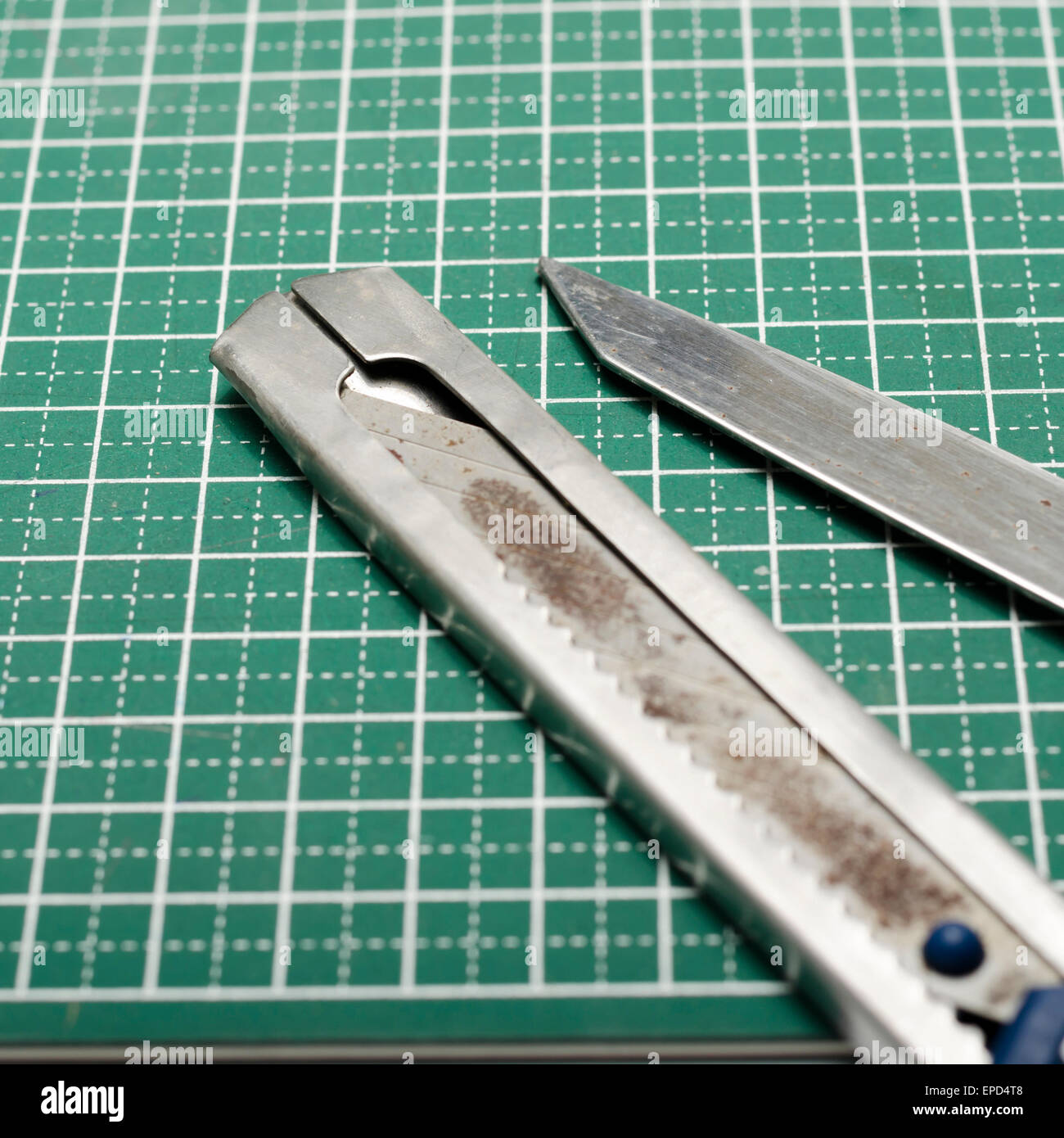 tools on green cutting mat Stock Photo - Alamy