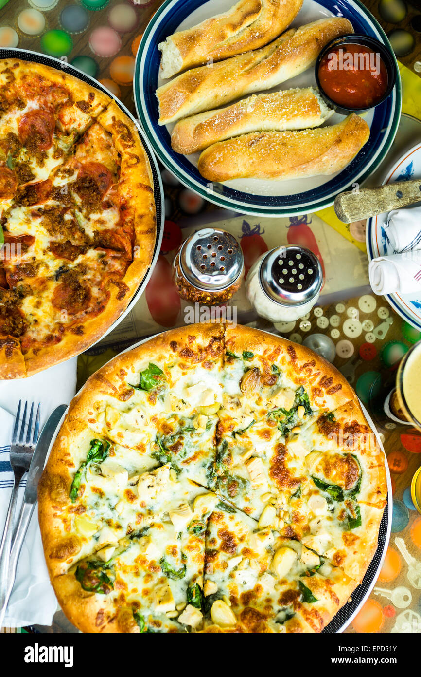 Fresh chicken pine nut pizza in Italian restaurant Stock Photo - Alamy