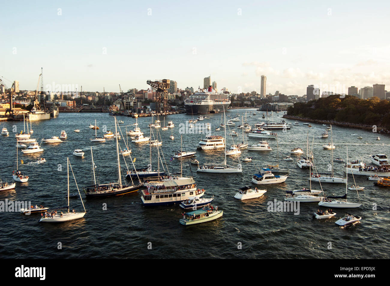 Sydney harbor with Opera House during Queen Elizabeth 2 visit. QM2 on ...
