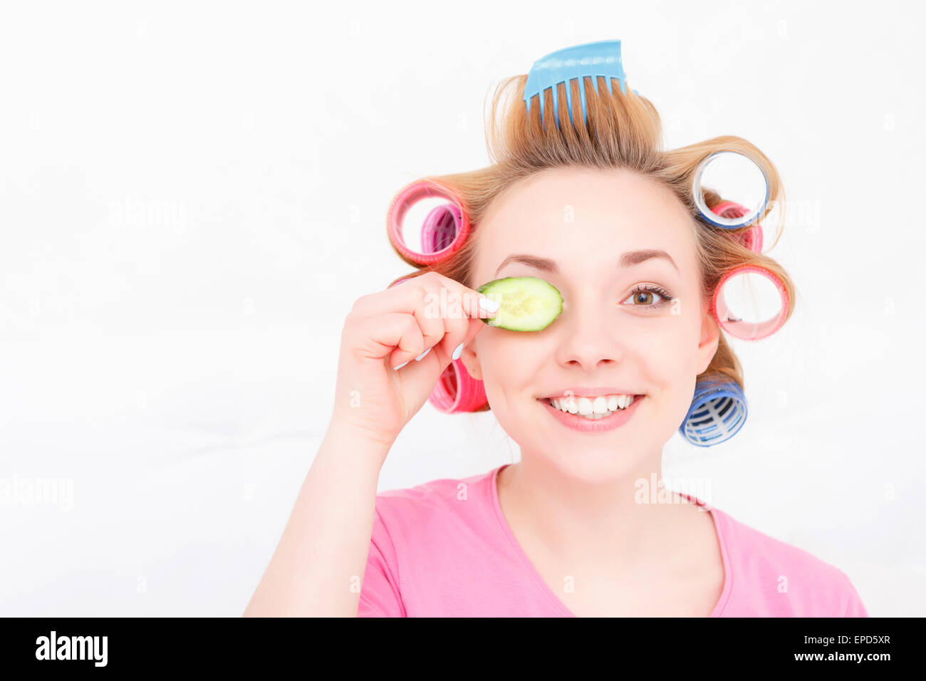 Young girl with curlers on her hair Stock Photo - Alamy