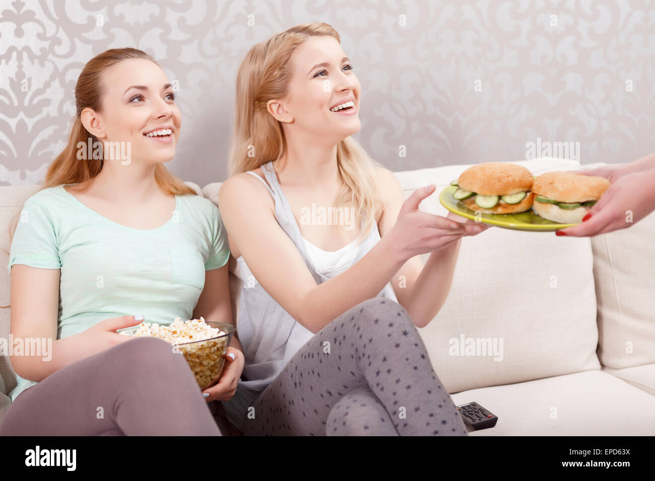 Young girls having lunch at pajama party Stock Photo - Alamy