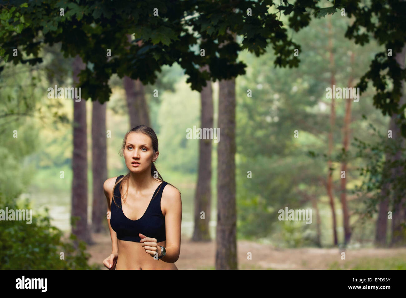 healthy lifestyle fitness sporty woman running early in the morning in ...