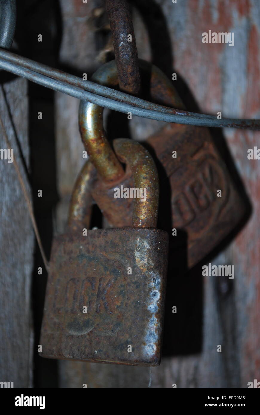 Two joined old padlocks Stock Photo - Alamy