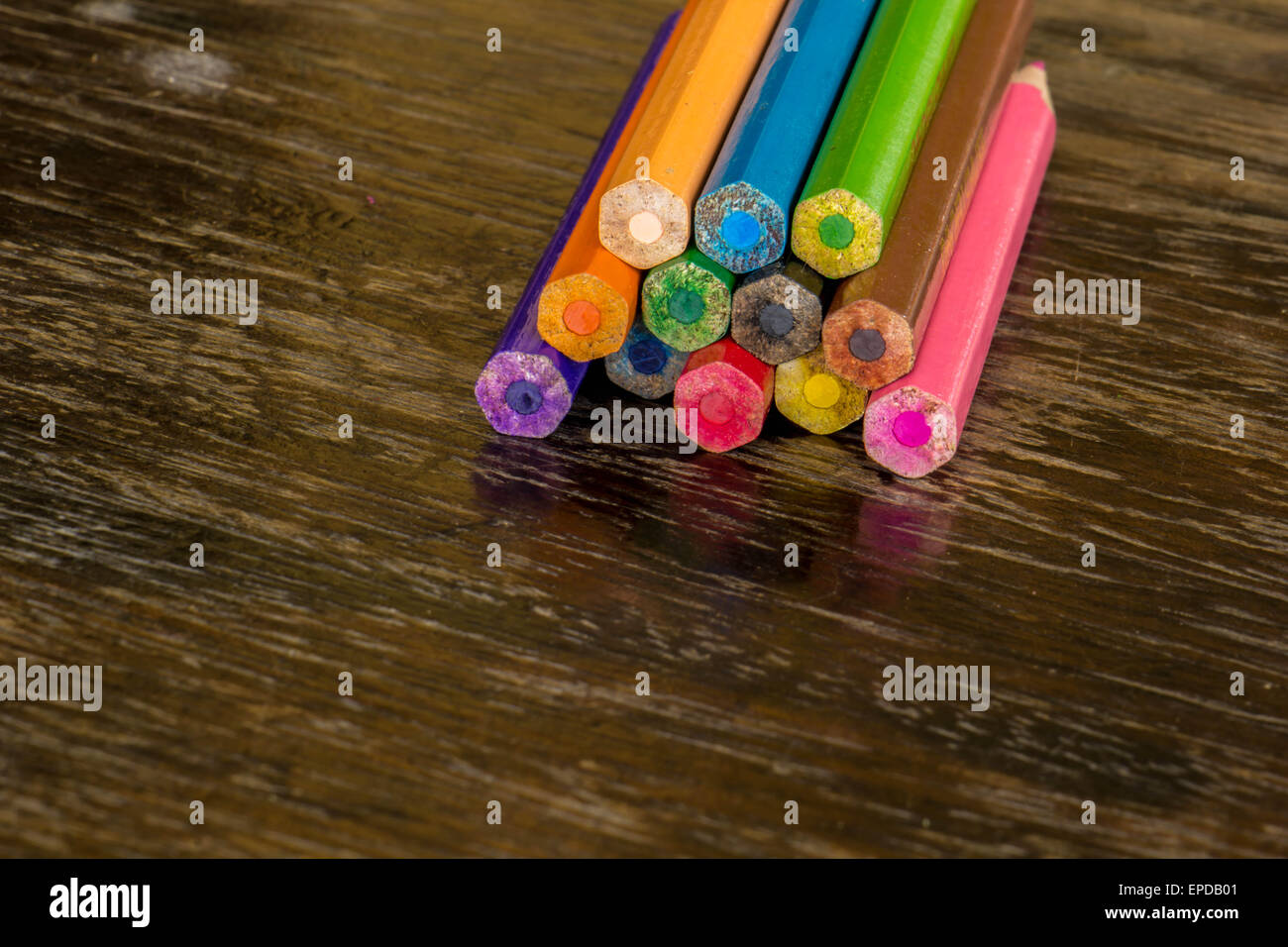 Sort crayons flooring surfaces, bright colors, red, yellow, black ...