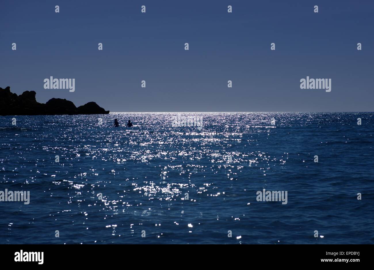 Romantic sunset and couple in the sea, beautiful sunset and man and ...