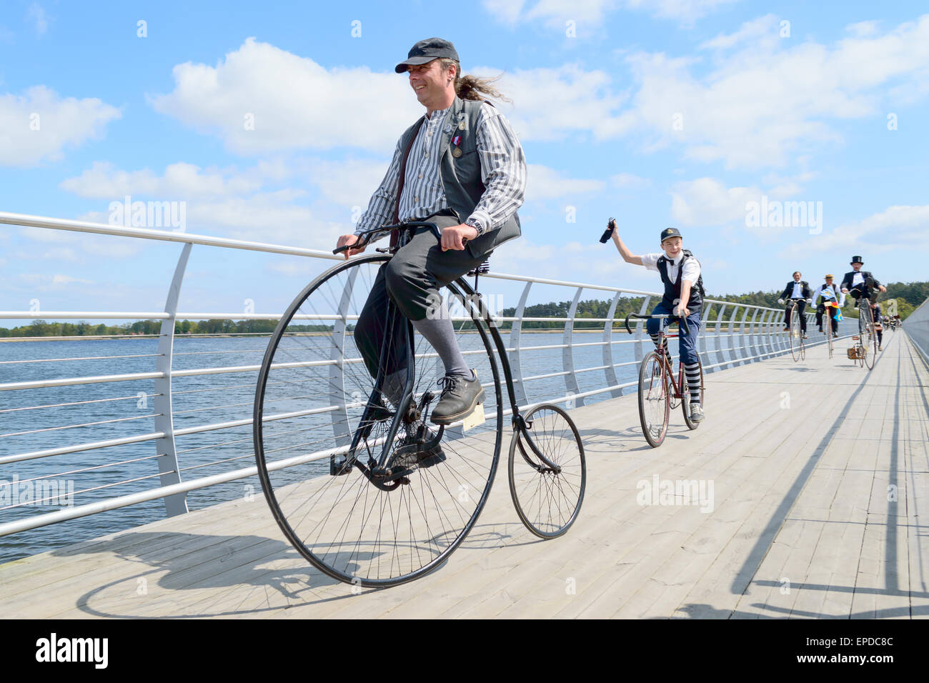 Man penny farthing bicycle in hi-res stock photography and images - Alamy