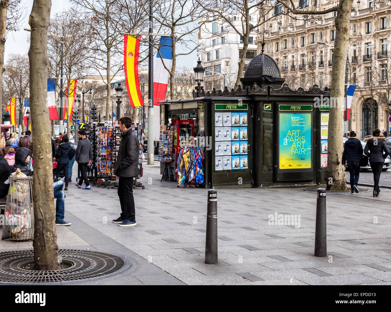 Paris, Champs Elysees broad sidewalk, kiosk selling newspapers. French ...