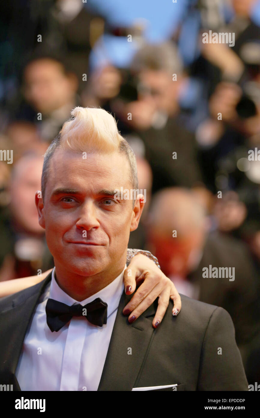 British pop singer Robbie Williams and wife (unseen) attend the ...