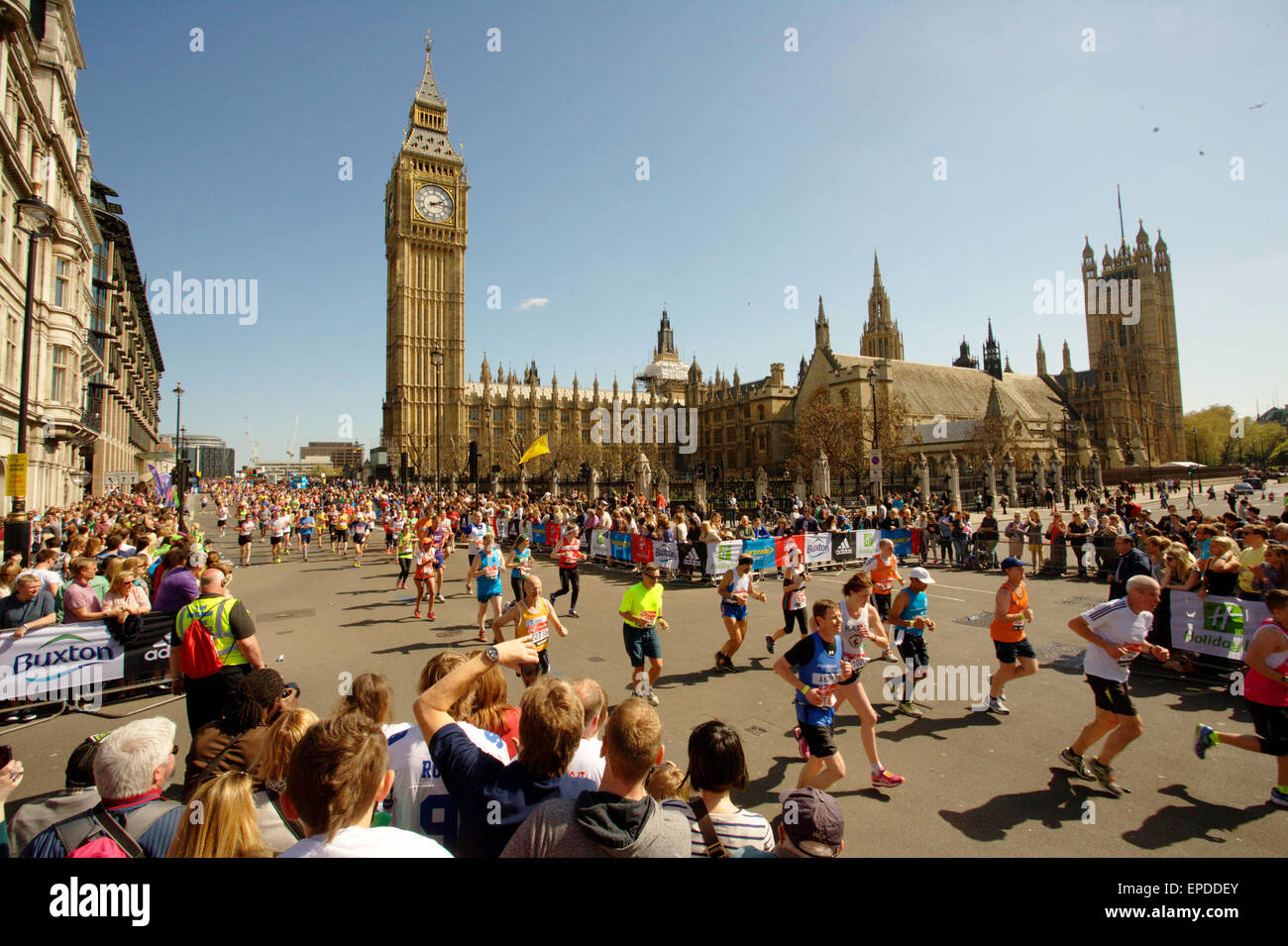 London Marathon runners pass Big Ben, the Houses of Parliament and ...