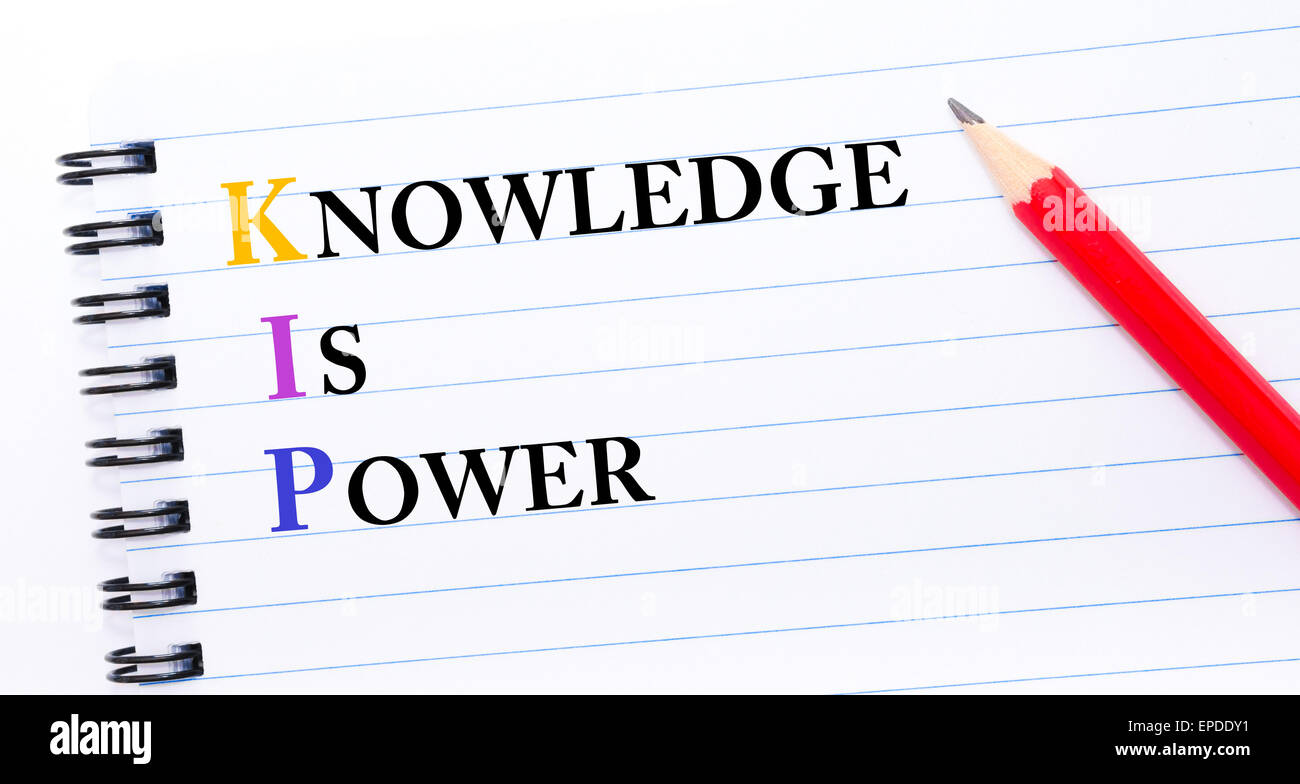 Knowledge Is Power Text written on notebook page, red pencil on the ...