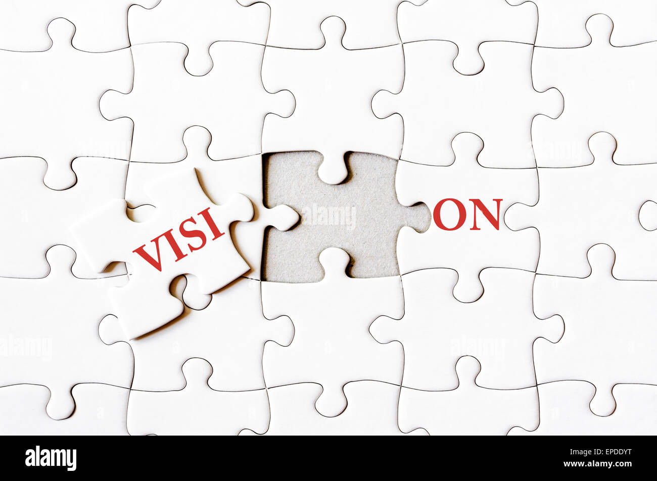 Missing jigsaw puzzle piece completing word VISION. Business concept ...