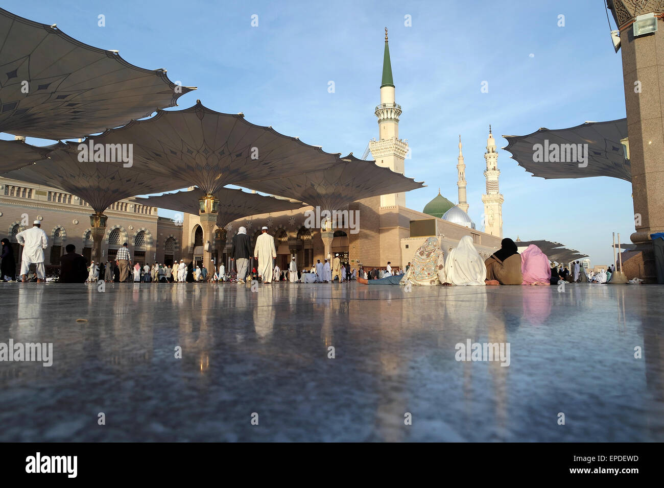 MEDINA, KINGDOM OF SAUDI ARABIA (KSA) - JAN 31: Women sitting in front ...