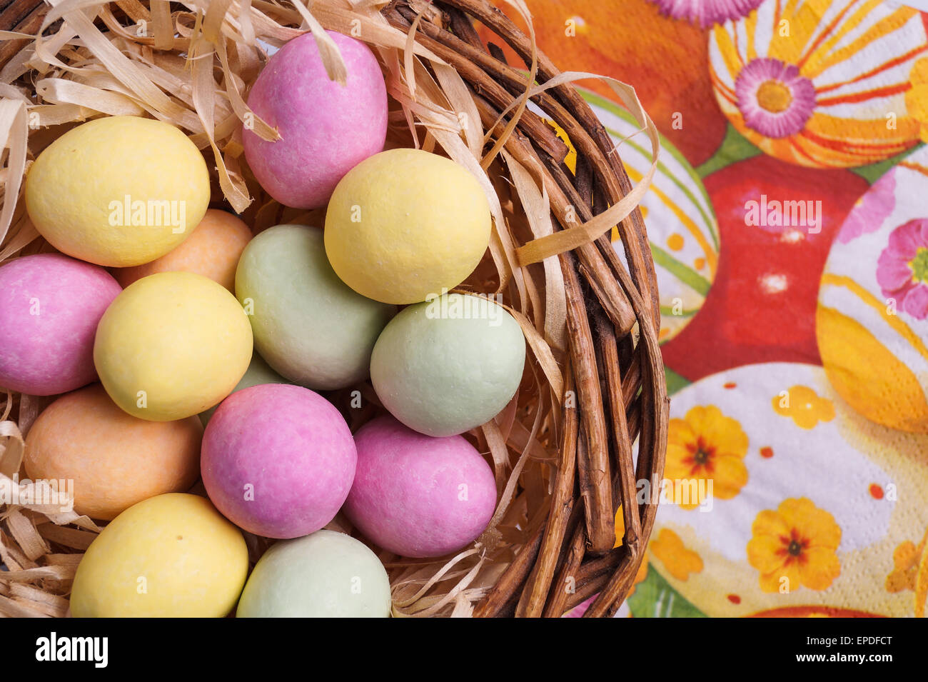 Easter Egg in Basket. Colourful Holliday eggs Stock Photo - Alamy
