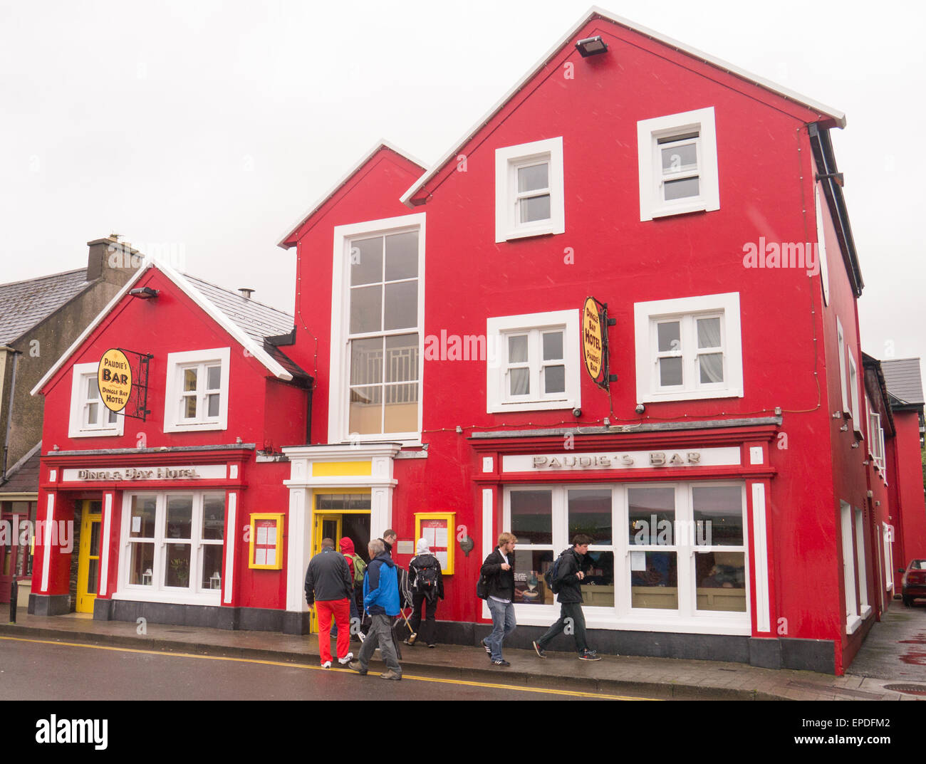 Pubs and other brightly coloured buildings in Dingle, a small town on ...