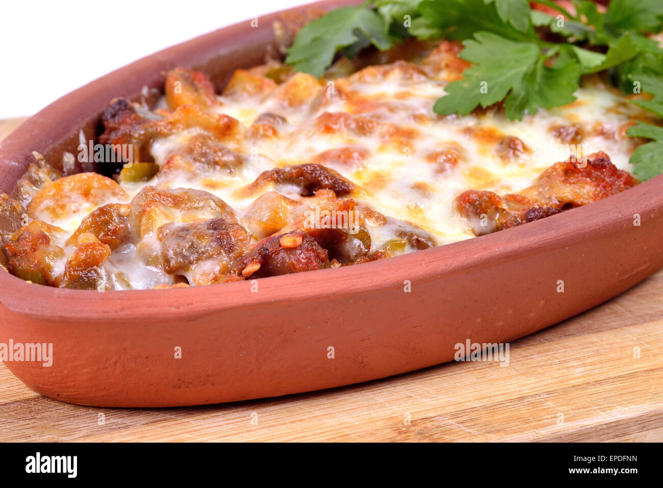 stew cooked by meat, cheddar cheese and mushroom Stock Photo - Alamy