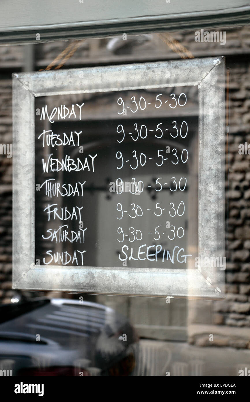 Opening times notice hi-res stock photography and images - Alamy